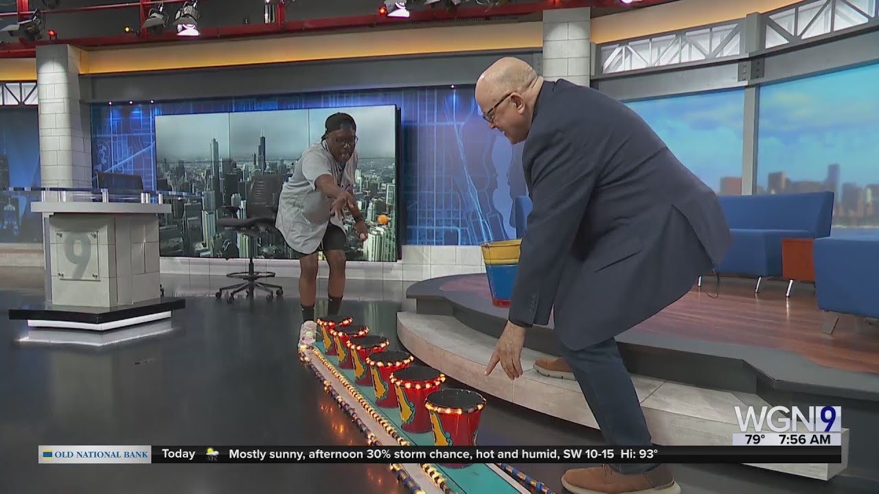 Jason Weaver gets a little practice in before throwing out the first ...