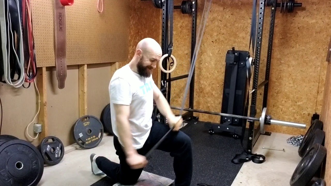 Half-kneeling band wood chop - YouTube