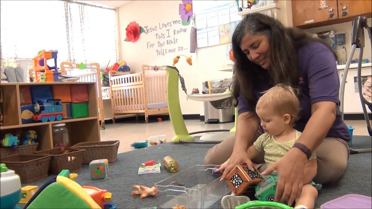 Infant Classroom Center Time Teacher Playing - YouTube