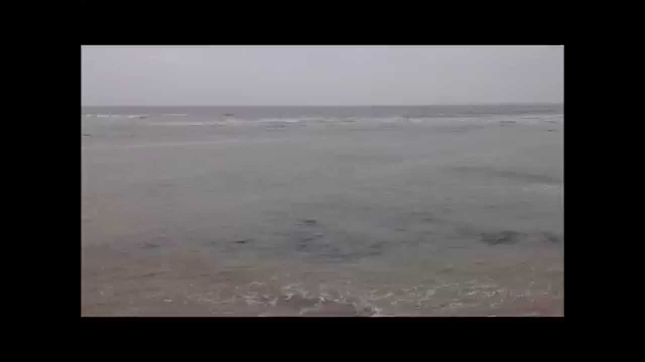 Time lapse of tide coming in during partial solar eclipse. - YouTube