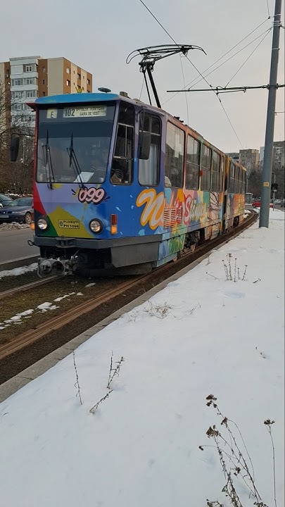 Ploiesti: Tramvaiul Tatra KT4D #099 repartizat liniei 102 traversand Sos.Vestului în zona ...