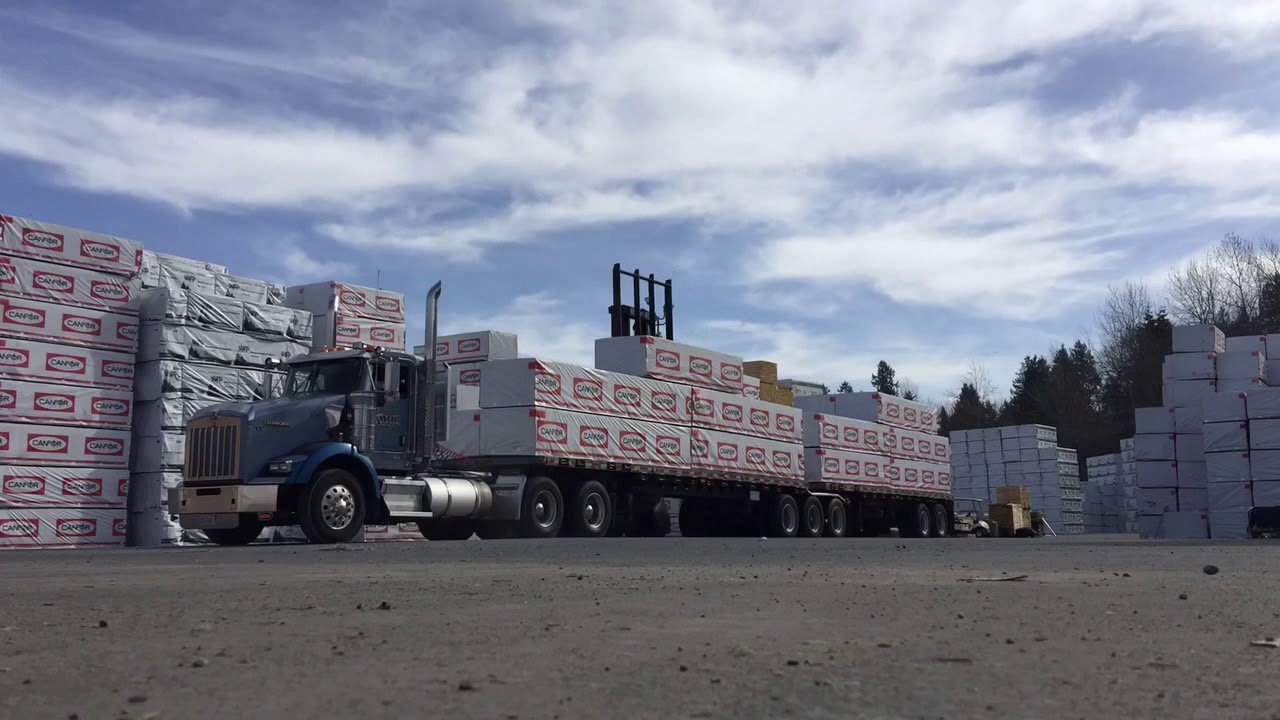 Canadian trucker drop Lumber on site - super b driver ( B. C. Canada ...