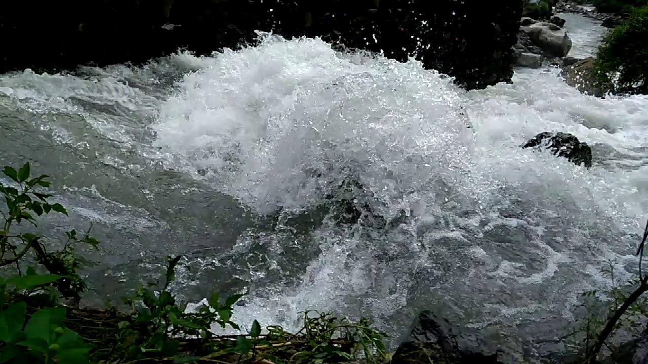 Slow-motion video of water stream through a channel. - YouTube