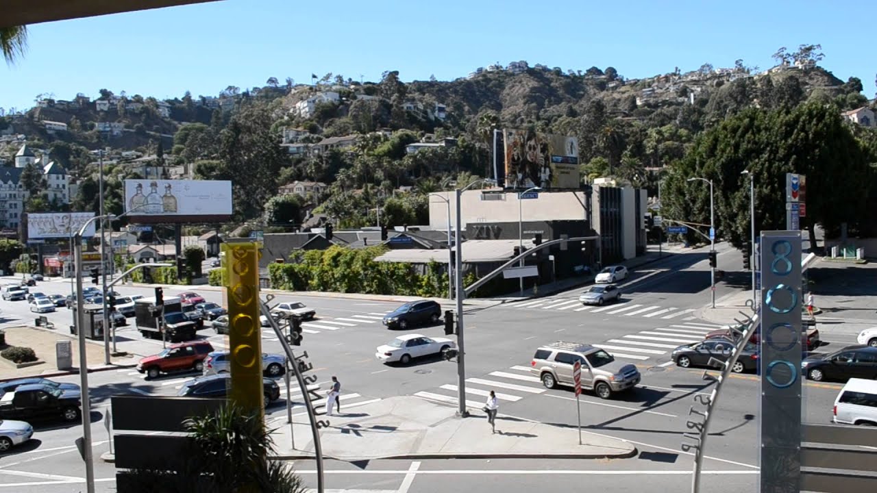 Traffic at the intersection of Sunset Blvd and Crescent Heights - YouTube