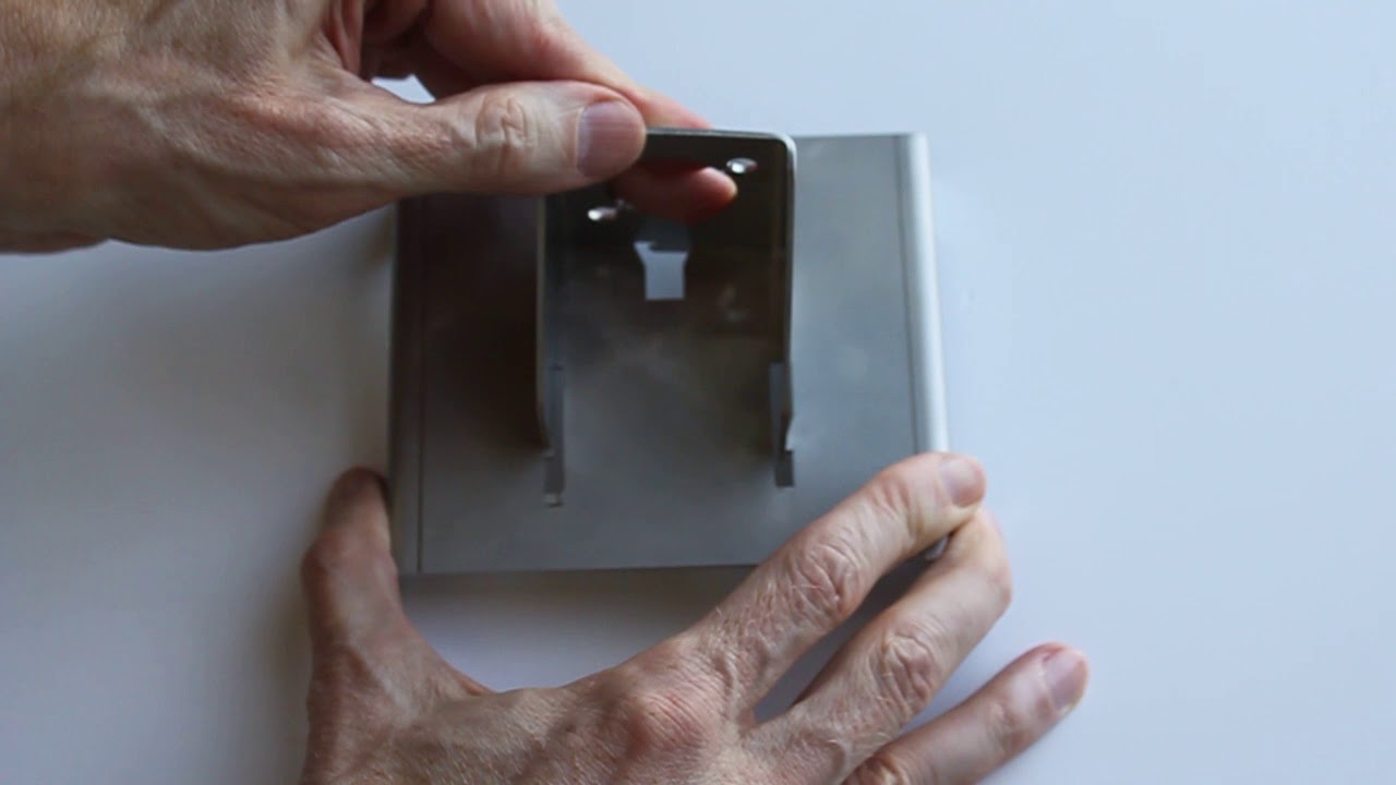 Fastening sheet metal: Elastic flanges in mating part with hooks - YouTube