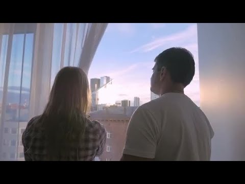 Couple Enjoys View From Window Stock Video