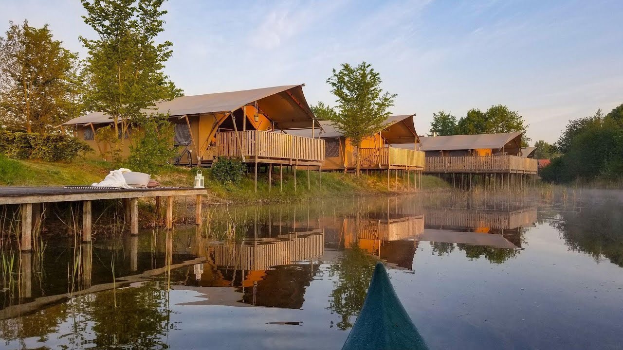 Combined tents with kitchen and bathroom located near a pond, Bant ...