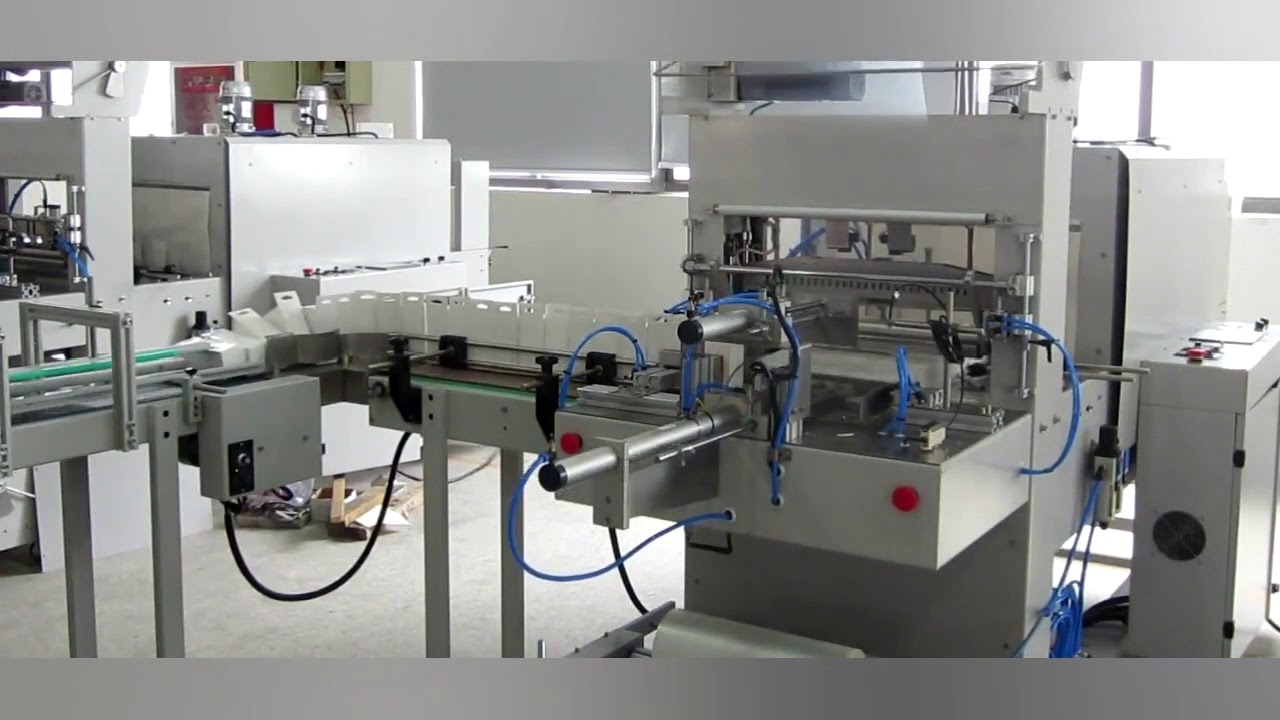 High speed bundle making and sleeve shrinking machine - YouTube