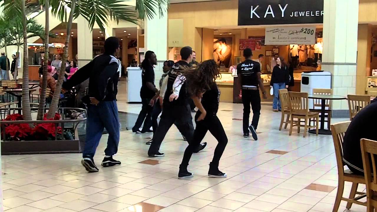 Mall Cop tries to interrupt Party Rock Shuffle Flash Mob!!! Too Funny ...