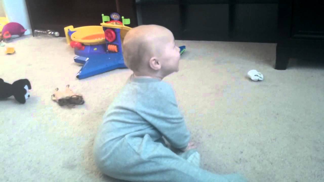 Baby laughs so hard, he falls over - YouTube