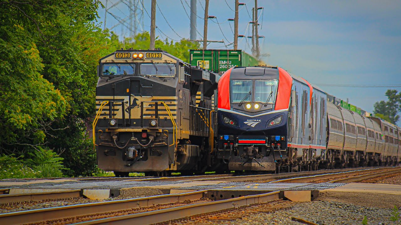 Amtrak 40 meets NS 277 in siding!! at MP329 in Archbold OH - YouTube