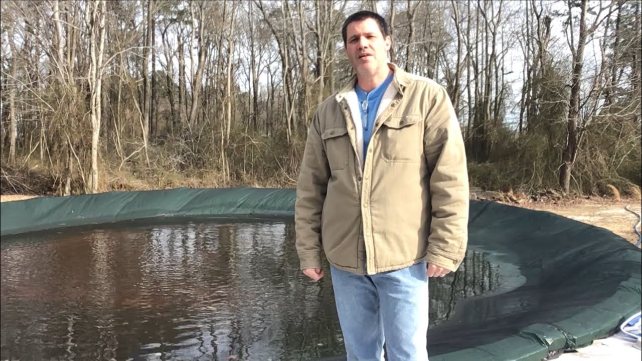 Pool cover fighting wind and rain. - YouTube