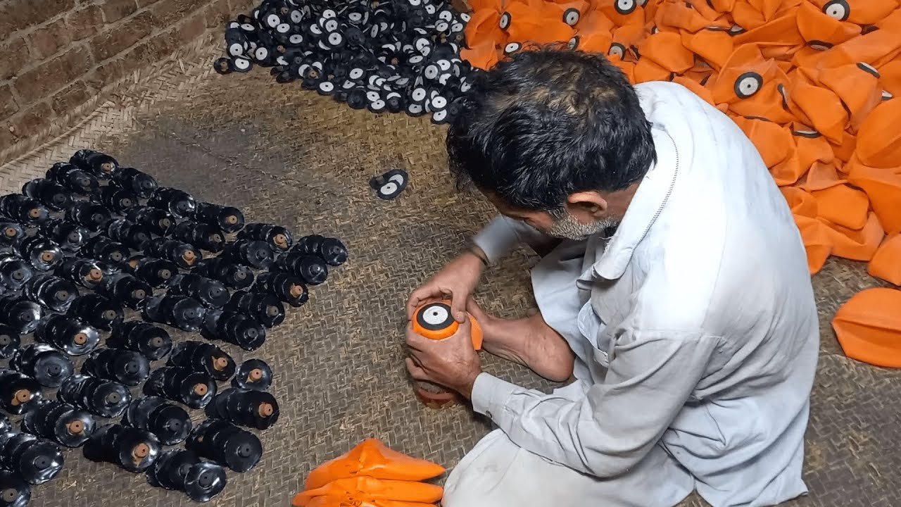 Process of Making football bladder [Robot Mass Prodder Technology is ...