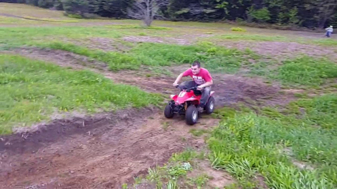 Tiny china 4 wheeler jump - YouTube