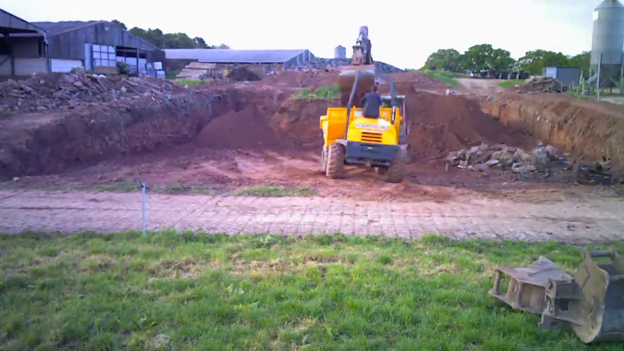 ARK silage clamps being installed into an earth bank - YouTube