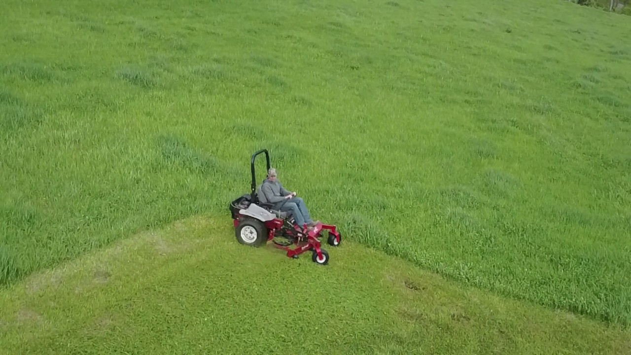 Exmark Lazer Z Mowing Tall Grass Drone Video By QUE Sales Inc - YouTube