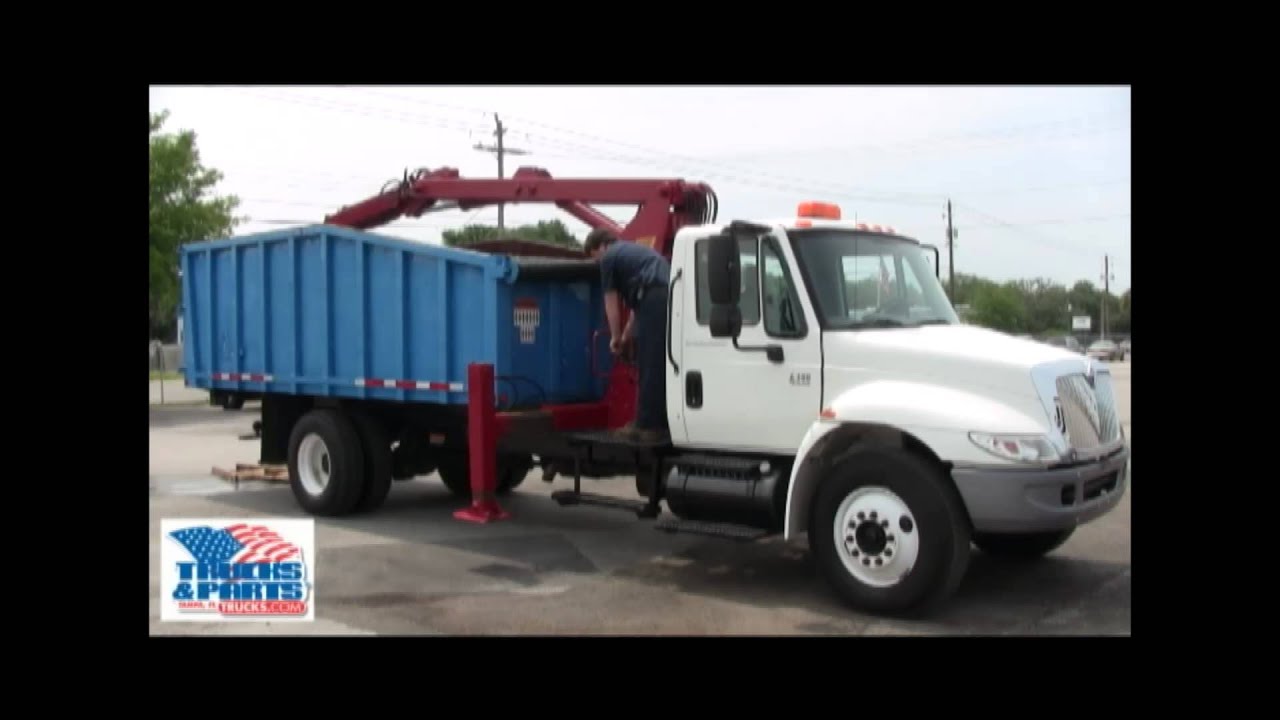 2006 International 4300 With Petersen TL3 Lightling Loader - YouTube