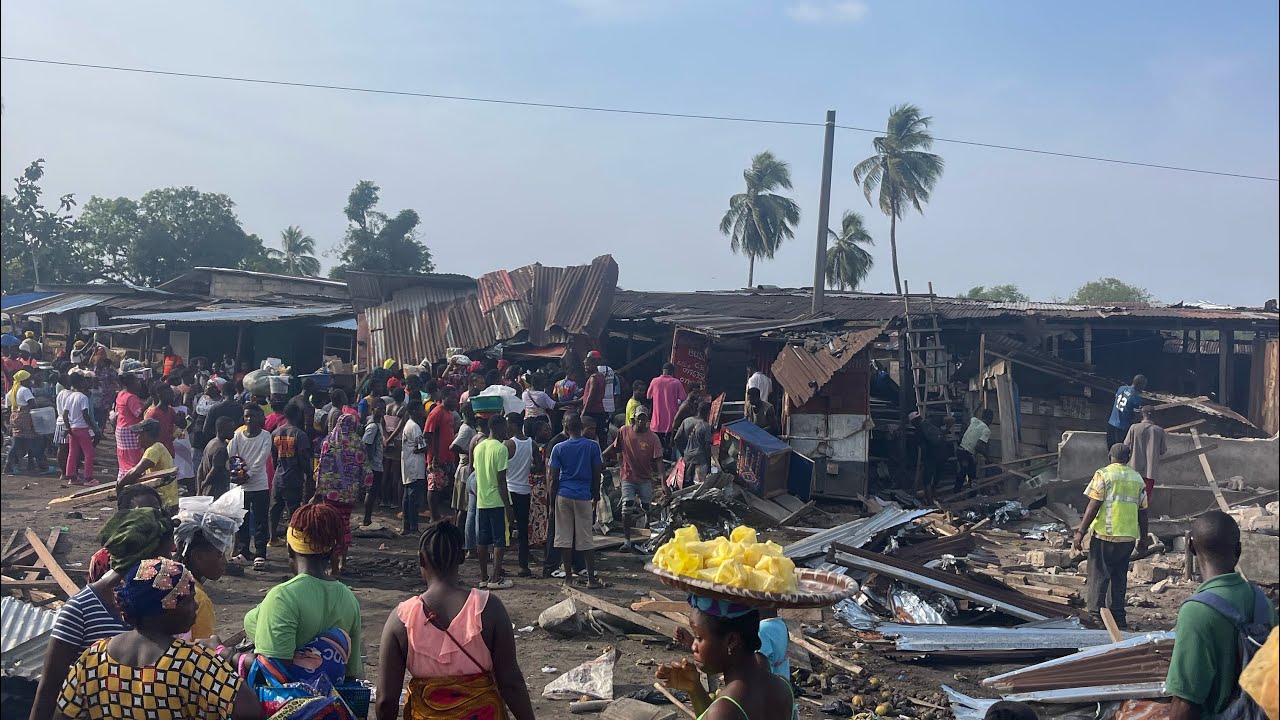 Mass destruction ongoing in duala Liberia biggest market - YouTube
