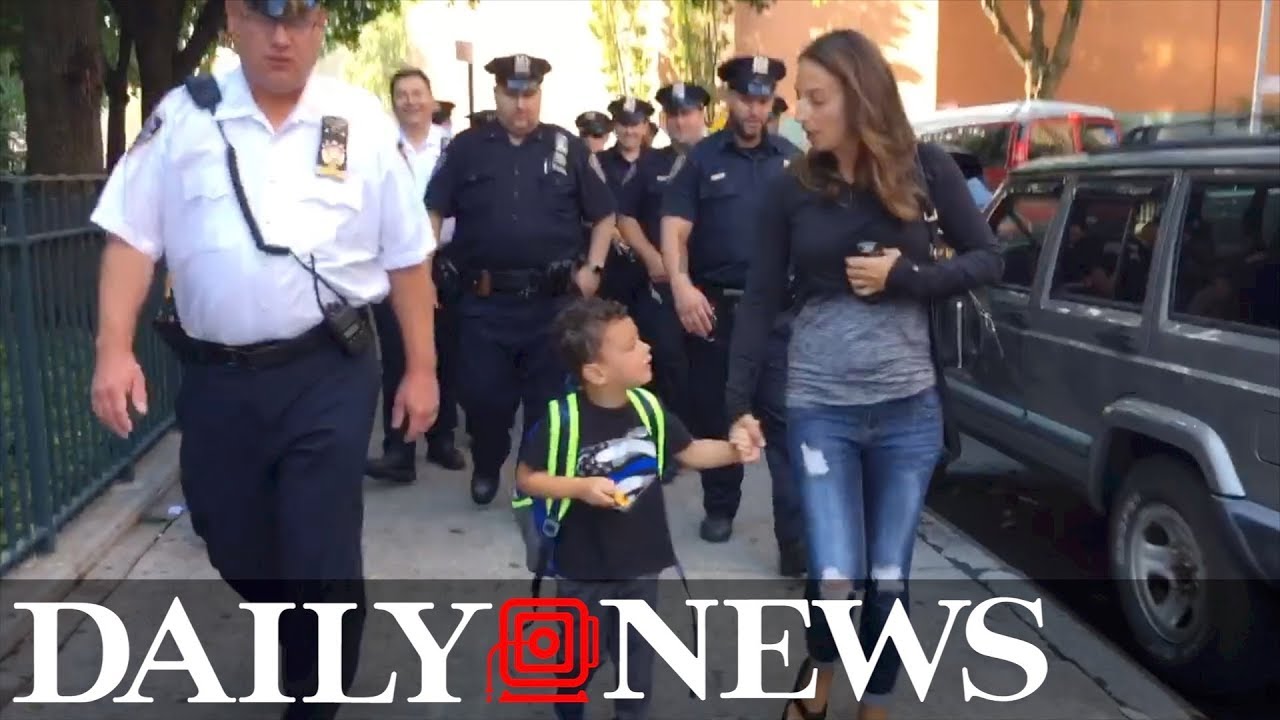 NYPD escort fallen cops's kid to first day of school - YouTube