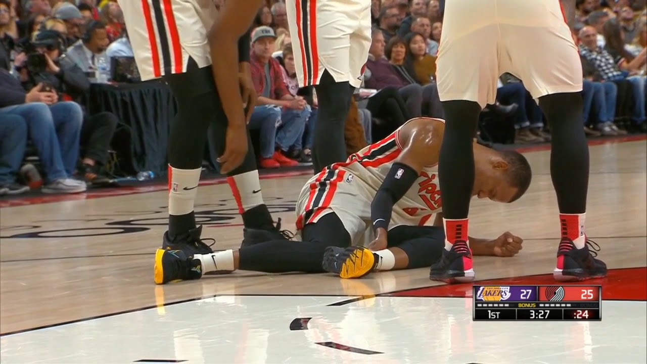 Rodney Hood suffers a lower leg injury going for a rebound - YouTube