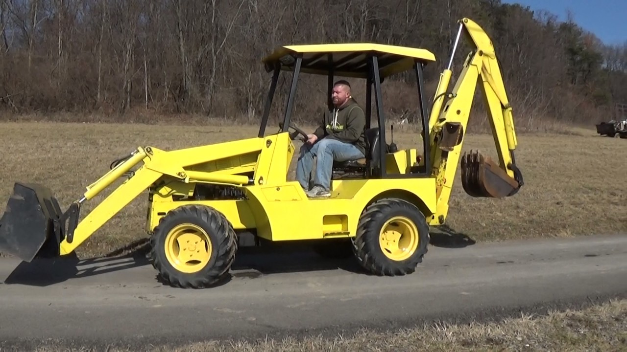 PREDATOR 425 4X4 TRACTOR WITH LOADER AND BACKHOE - YouTube
