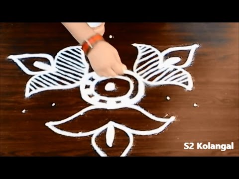 deepam rangoli designs with 7 to 4 Interlaced dots - easy diya rangoli ...