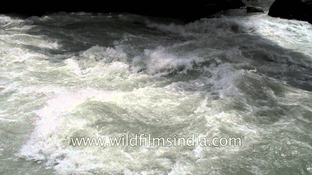 Slow motion shot of river raging - YouTube