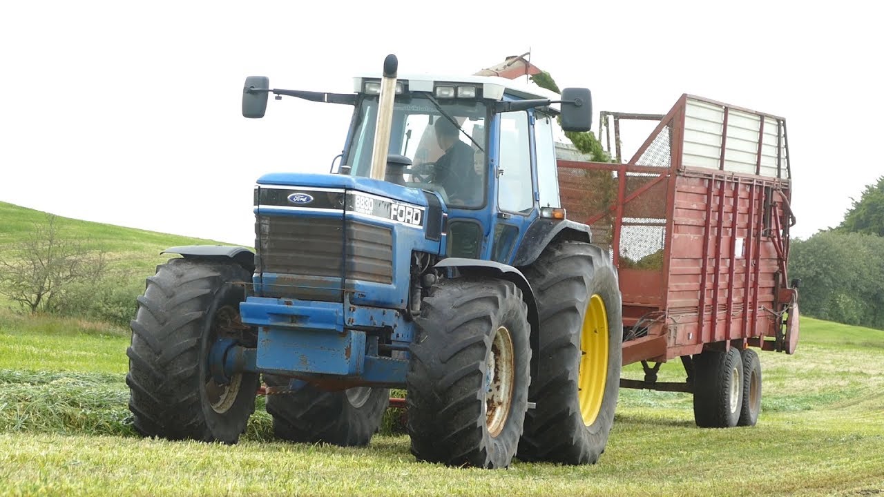 Ford 8830 Working Hard in The Field Cutting Grass w/ Old Taarup Forage ...