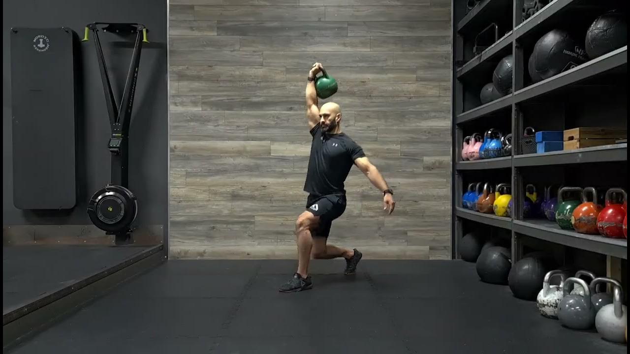 Single arm kettlebell overhead forward lunge - YouTube