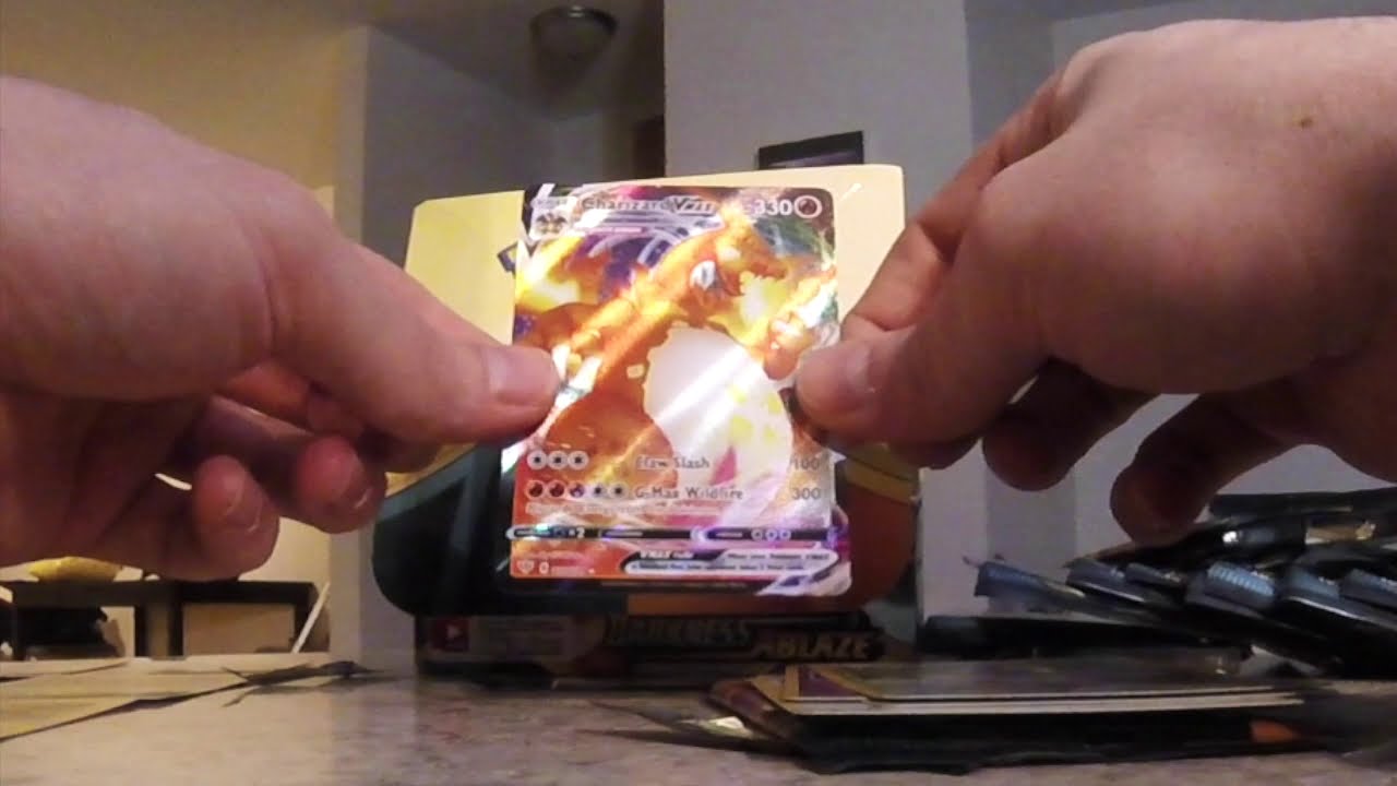 I PULLED A CHARIZARD VMAX Darkness Ablaze booster box pack. VERY COOL ...