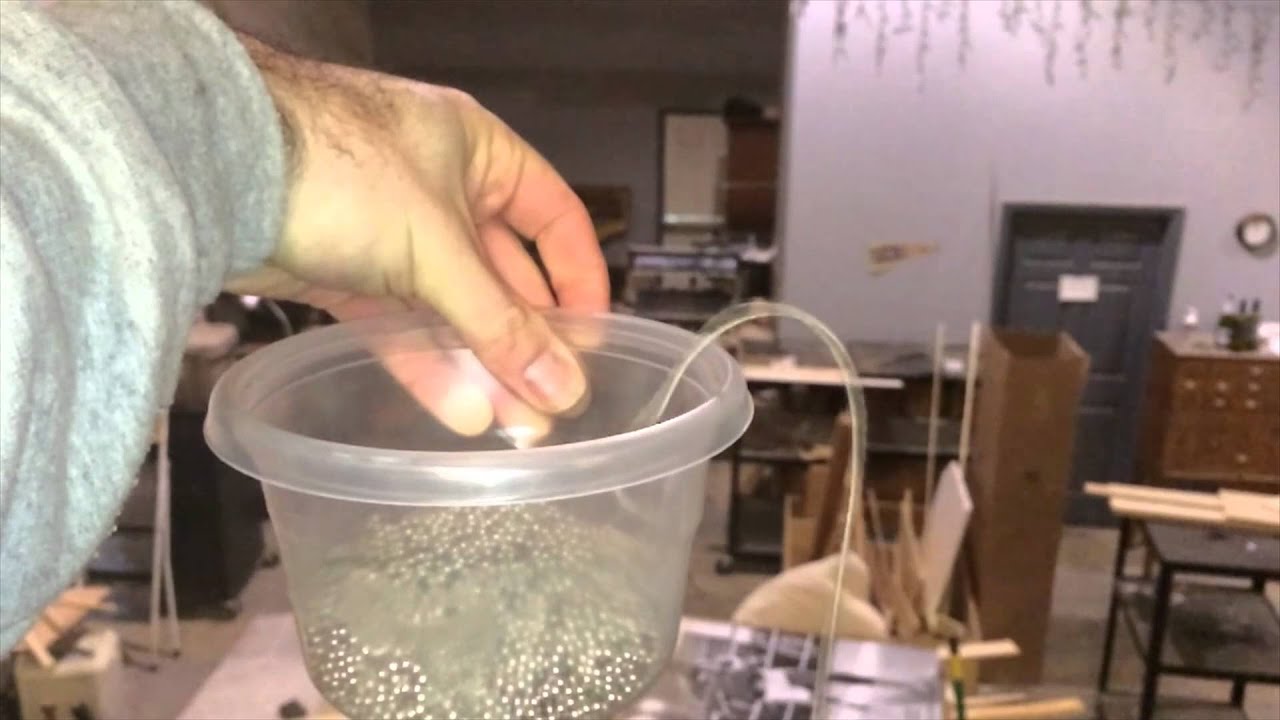 100ft Chain Siphon with a 10 foot drop - YouTube