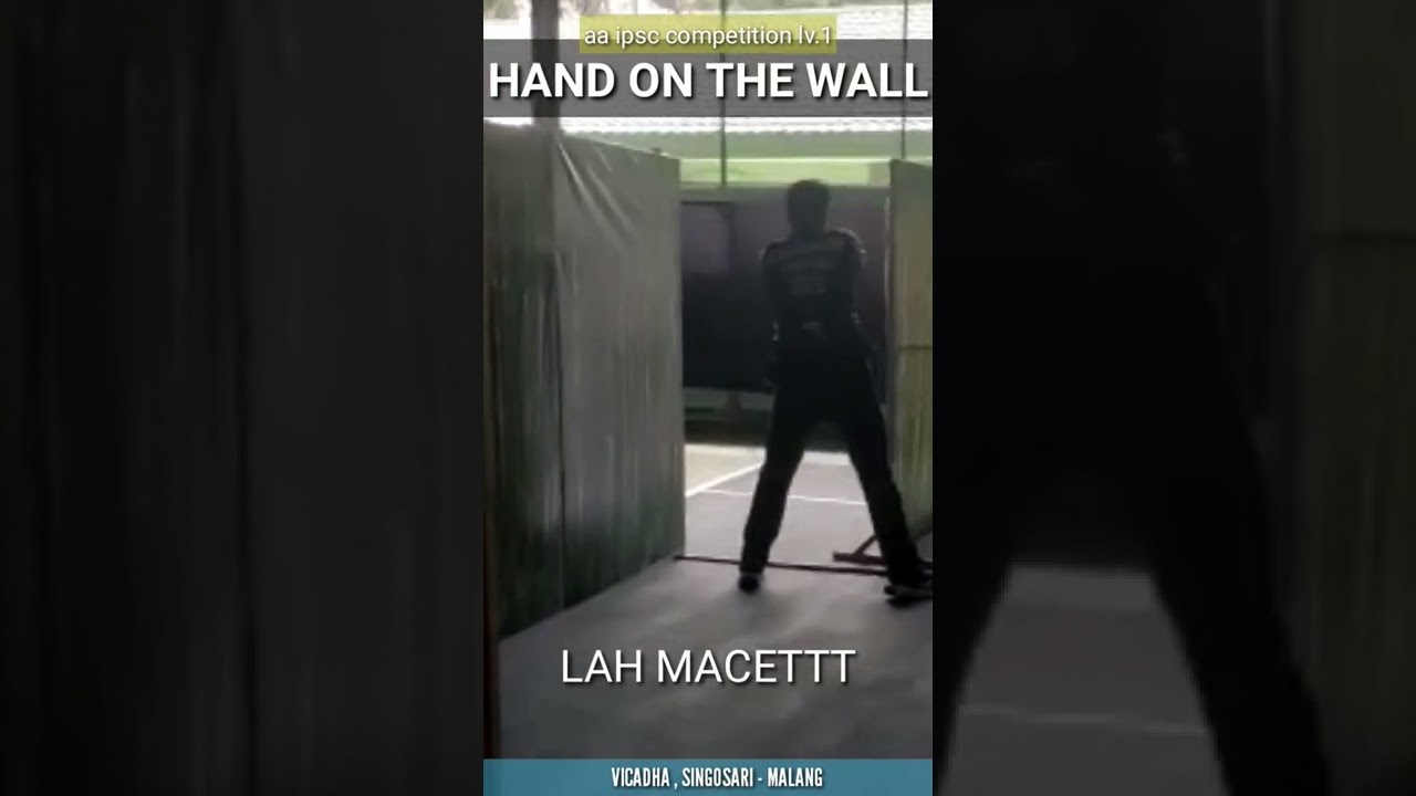 Hand on the wall shooting pistol - YouTube