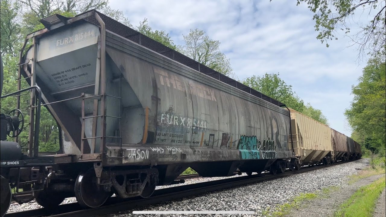 CSX Q332 with a Rock hopper car - YouTube