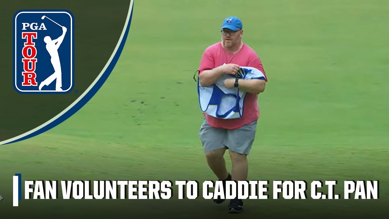 Random fan steps in to caddie for C.T. Pan | Golf on ESPN - YouTube