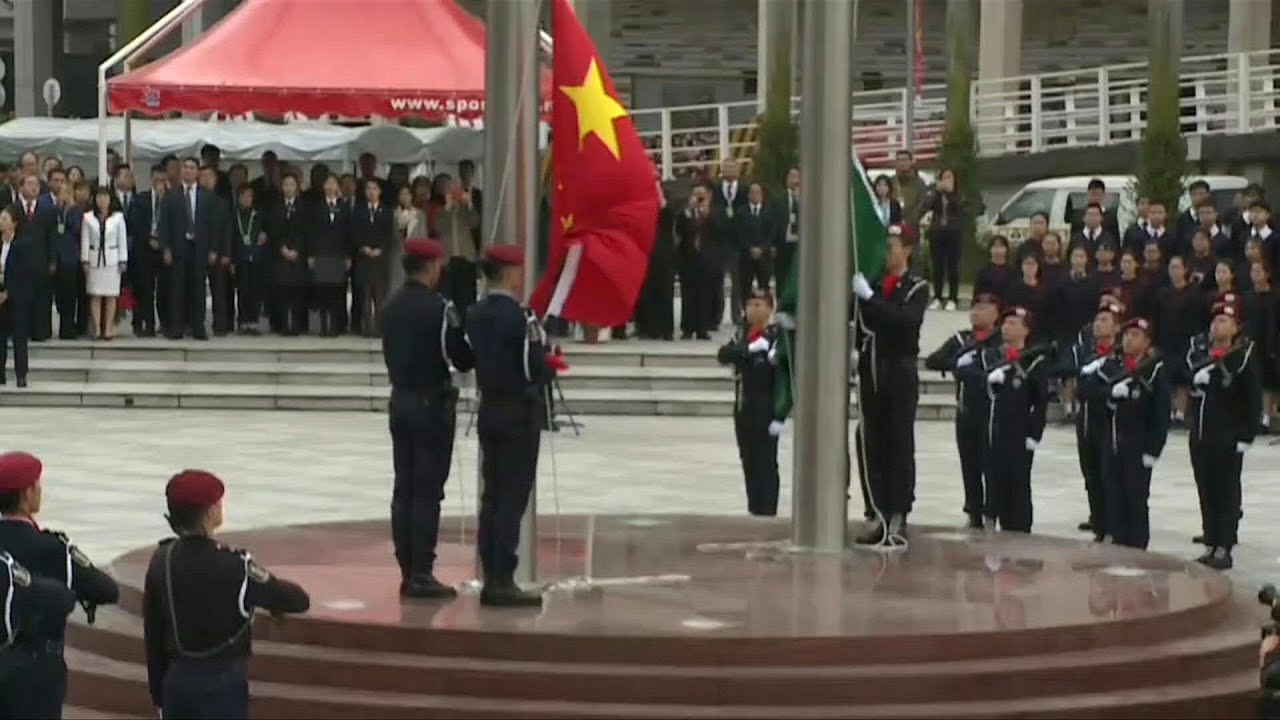 Flag raising ceremony for 20th anniversary of Macau handover to China ...