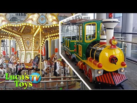 Children Train Rides, merry go round at the amusement park rides fun ...