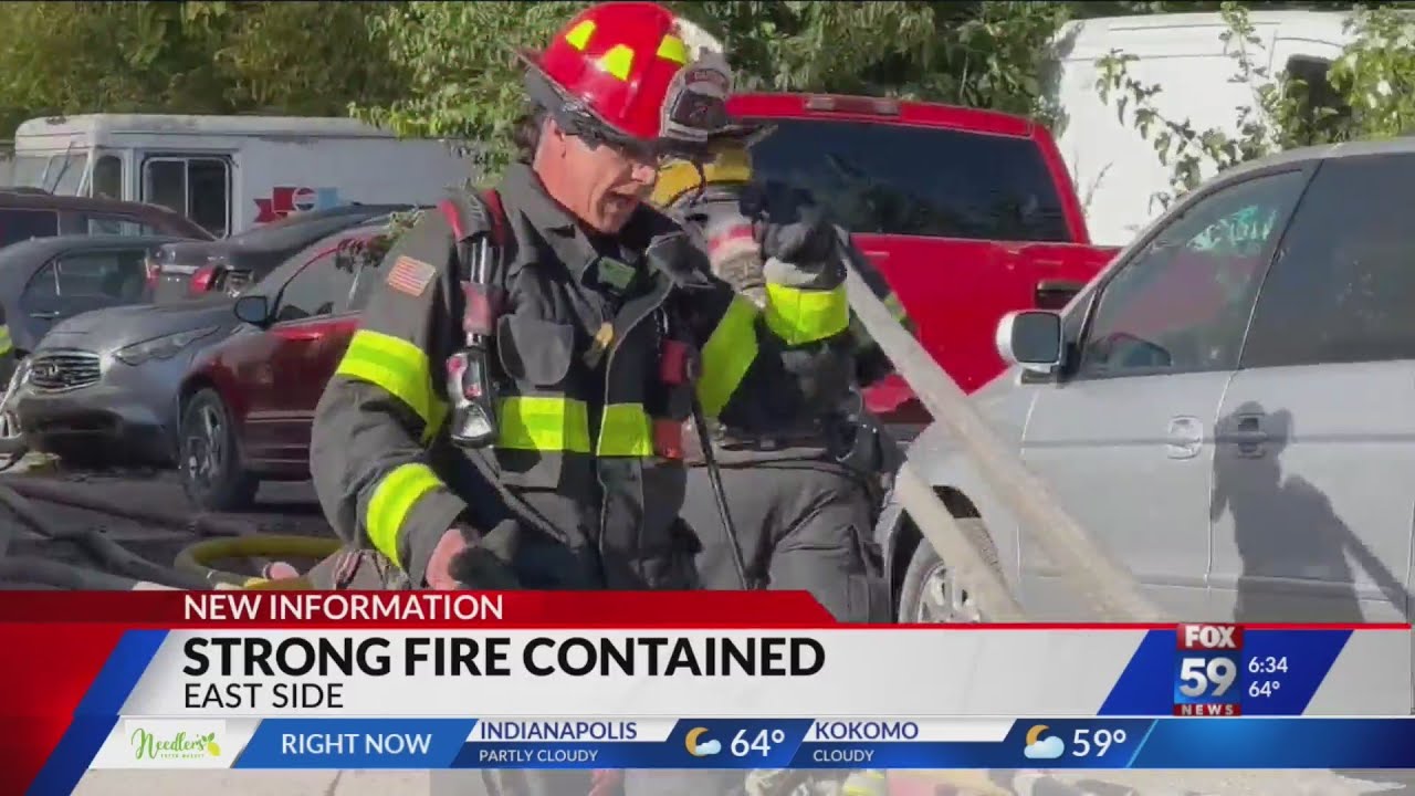 2 firefighters injured after car caught fire at auto body shop - YouTube