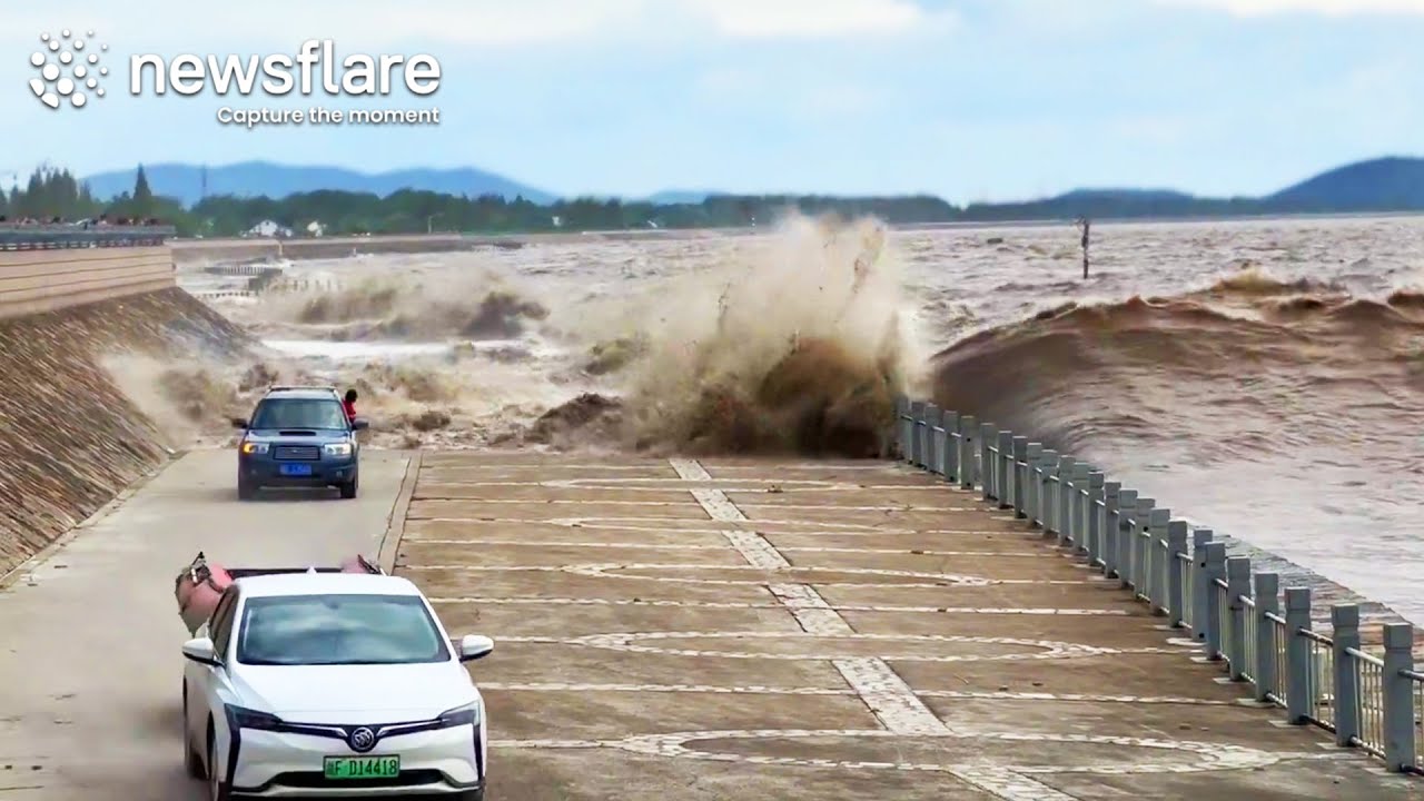 Huge Tidal Wave Chases Drivers In Crazy Footage - YouTube