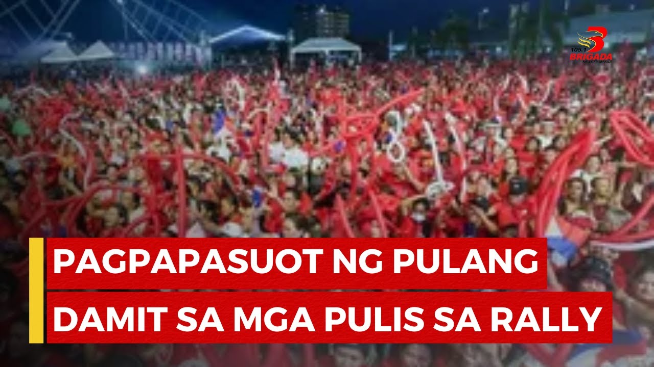 Pagpapasuot ng kulay pulang damit sa mga pulis sa campaign rally ...