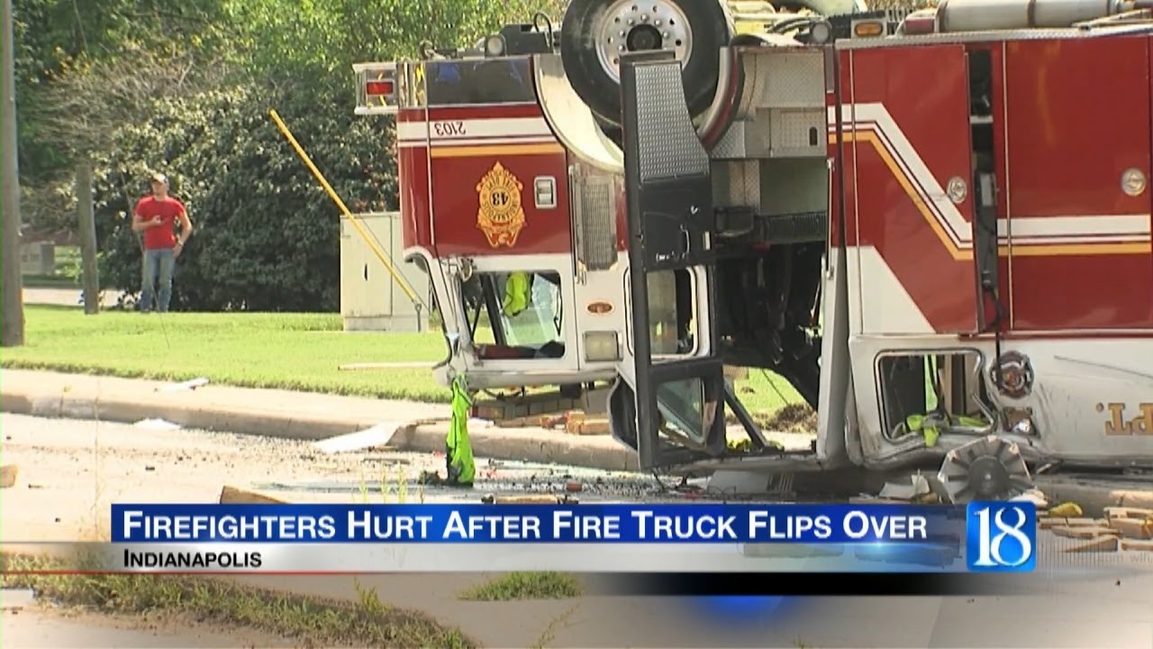 Firefighters Hurt After Fire Truck Flips Over - YouTube