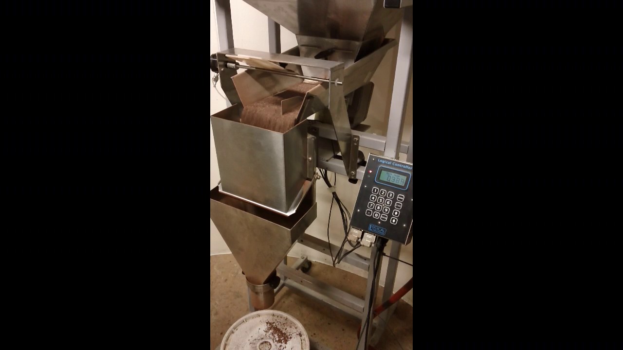 The Logical Machines Model S-4 Automatic Scale System filling 14oz ...