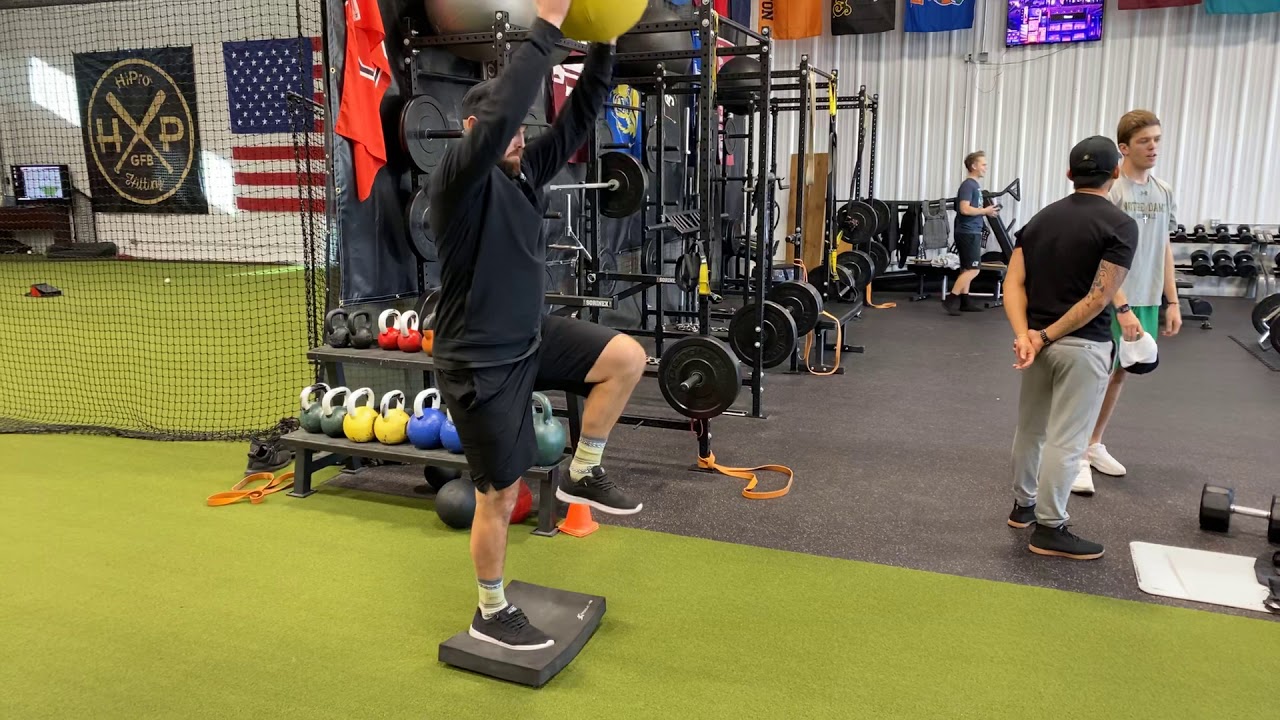 Med Ball Single Leg RDL on AirEx Pad - YouTube