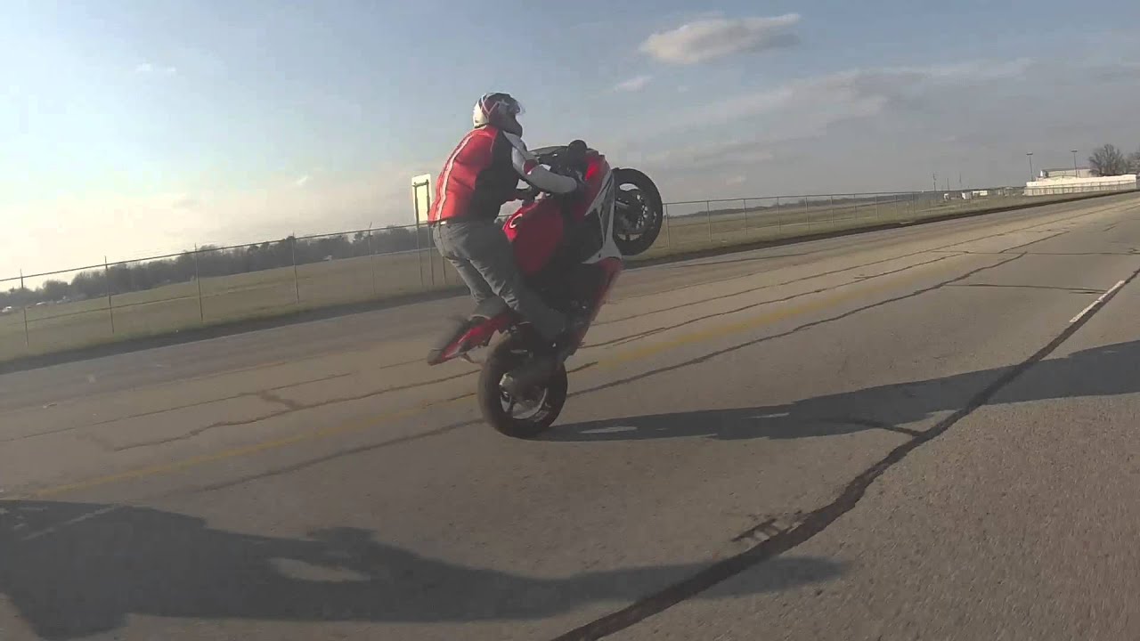 1st gear balance point wheelie - YouTube