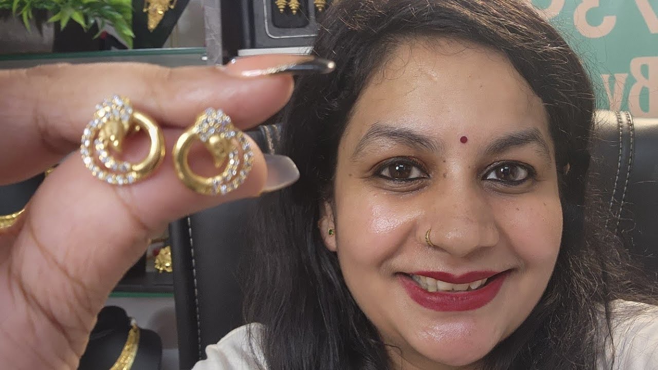 Stud gold Earrings designs Diamonds stud gold earrings look like real | New diamond gold ...