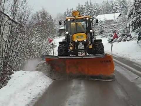 JCB Eco 4CX Snow plowing - YouTube