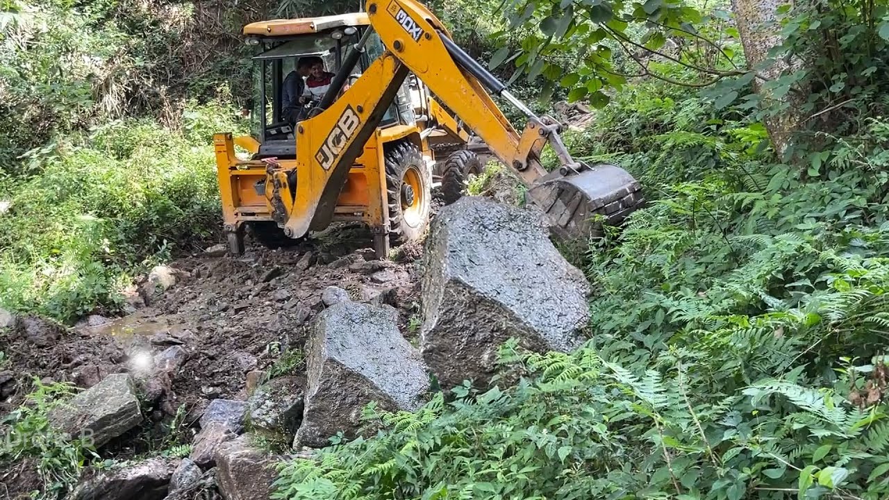 Removing Boulders and Stones from Steep Mountain River - YouTube