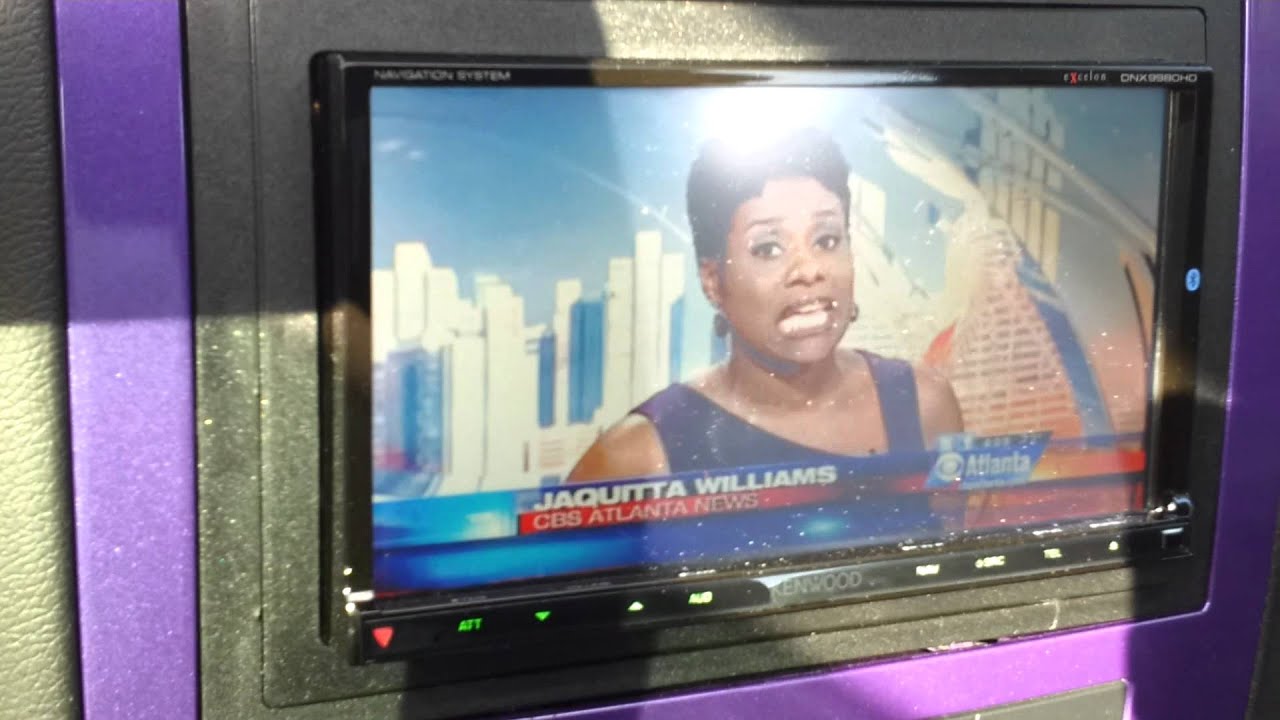 Watching news on live TV in car while driving down I-20 goin 70mph ...