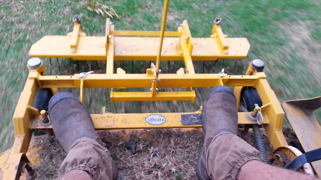 Dethatching with walker mower mb. Sexy legs. - YouTube
