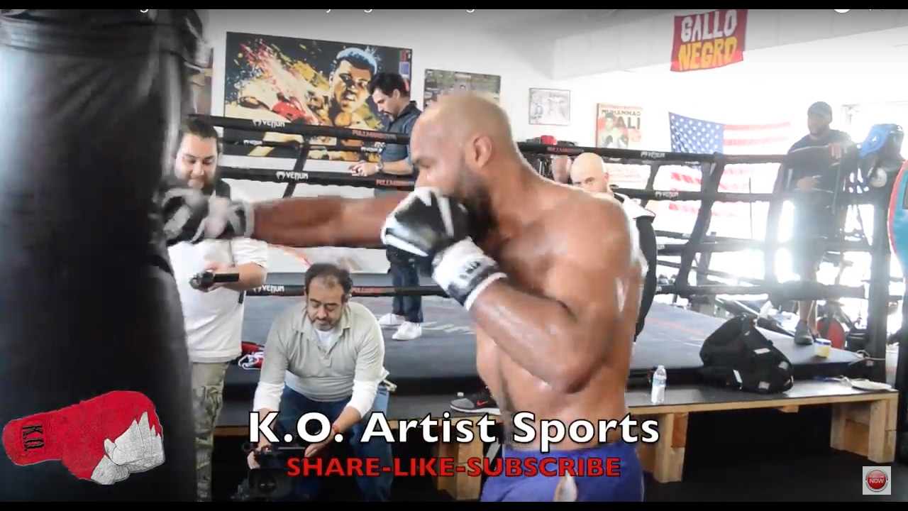 Gerald Washington SLAMS the heavy Bag! Bends bag in half with shots ...