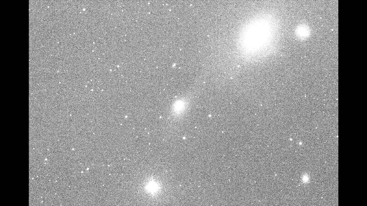 Comet C/2013 A1 Siding Spring Flying by Galaxies - YouTube